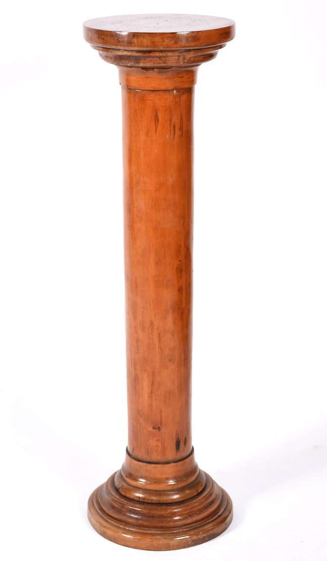 Coluna de madeira nobre em formato cilíndrico, ... - Galeria Alphaville