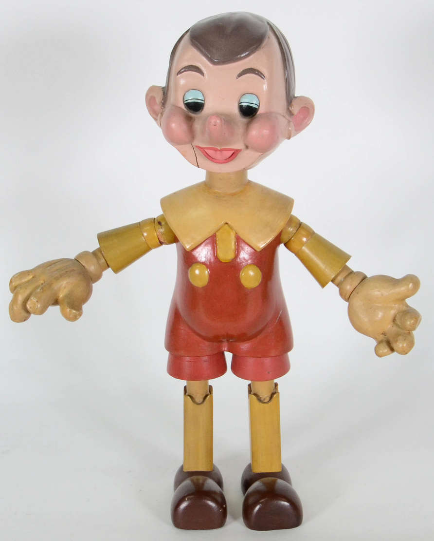 Boneco em madeira articulada representando Pinó... - Galeria Alphaville